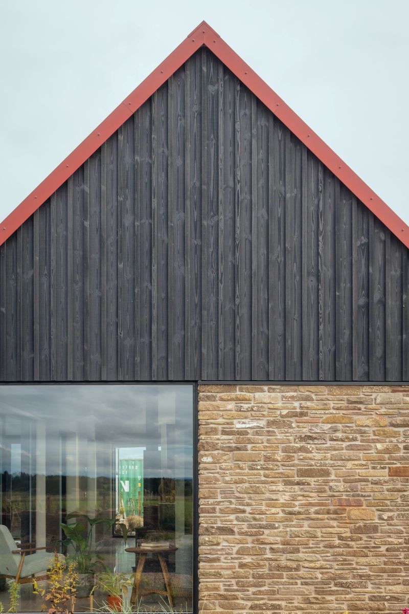 Even with its red roof, this house in Angus blends in