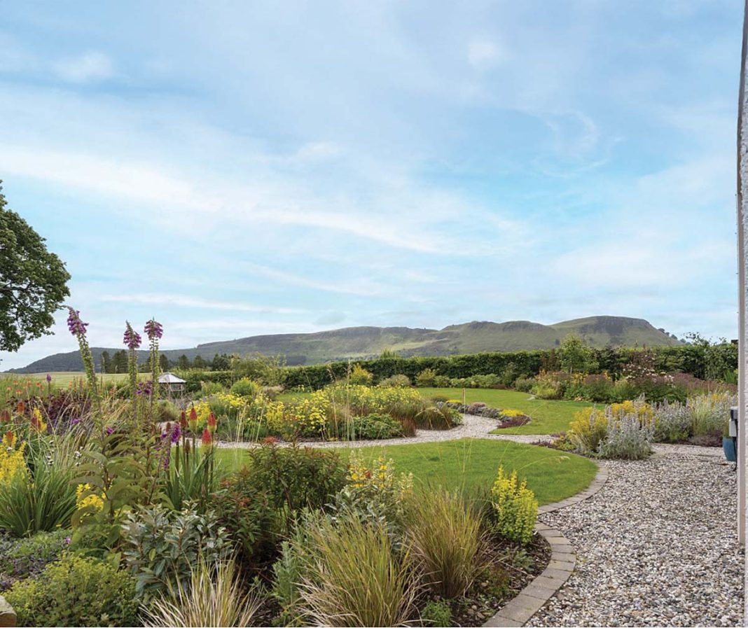 This Kinross garden is bursting with blooms on Loch Leven shores